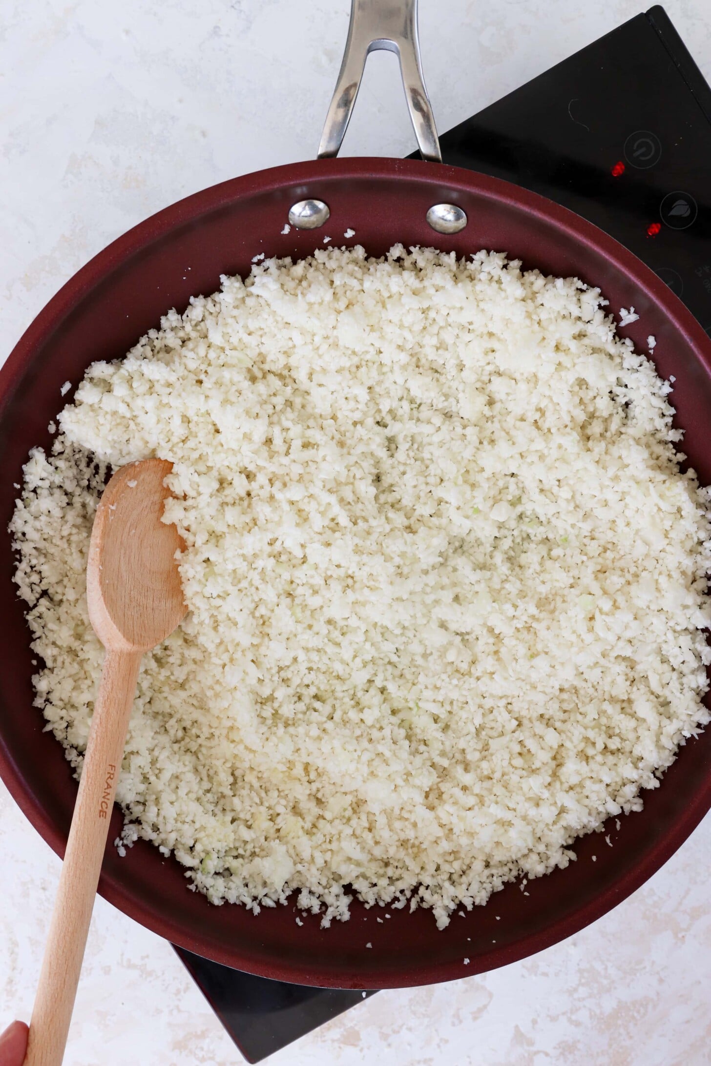 Easy DIY Raw Cauliflower Rice Recipe (That's Not Mushy!) - Lindsay ...
