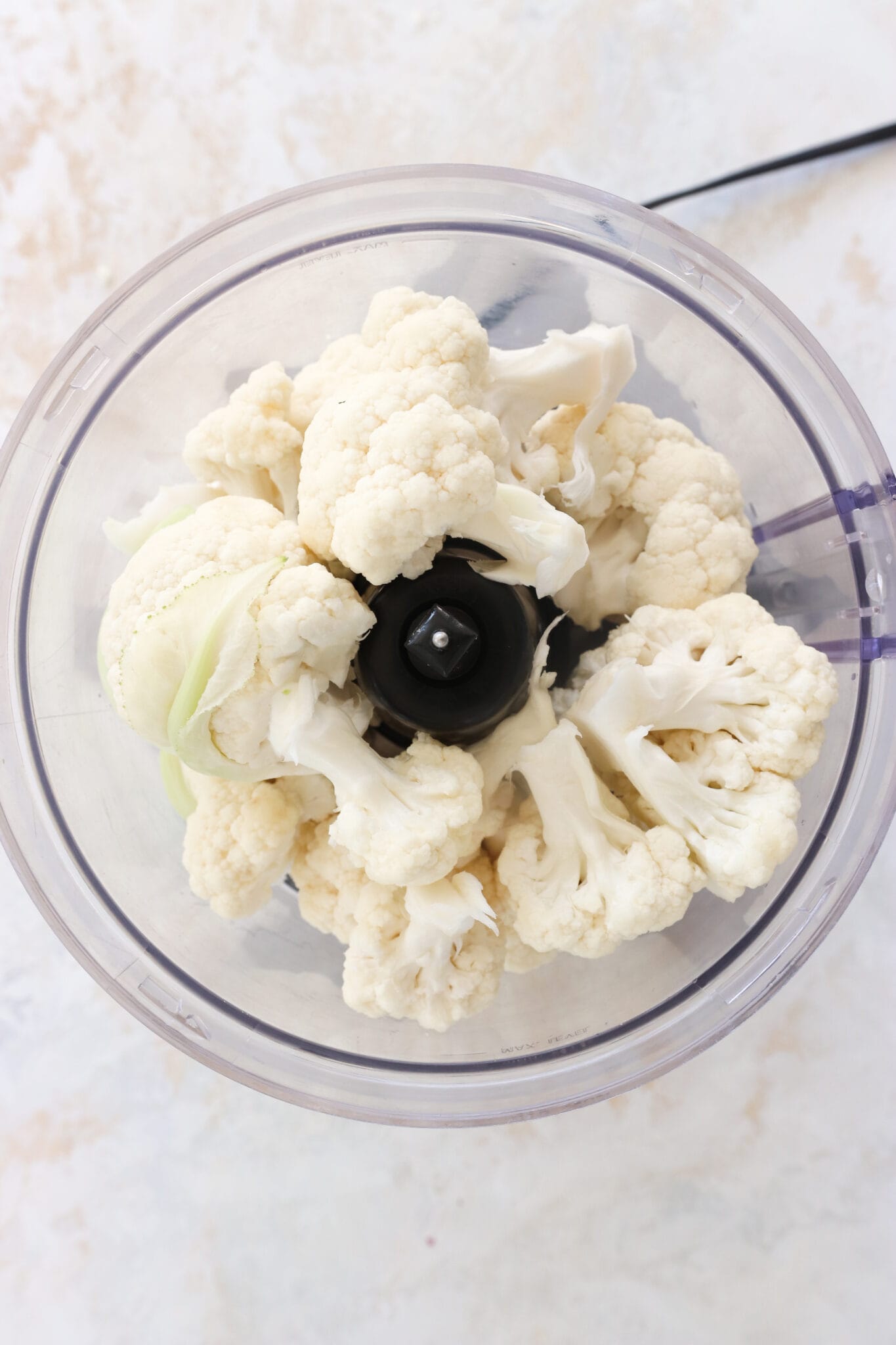 Easy DIY Raw Cauliflower Rice Recipe (That's Not Mushy!) - Lindsay ...